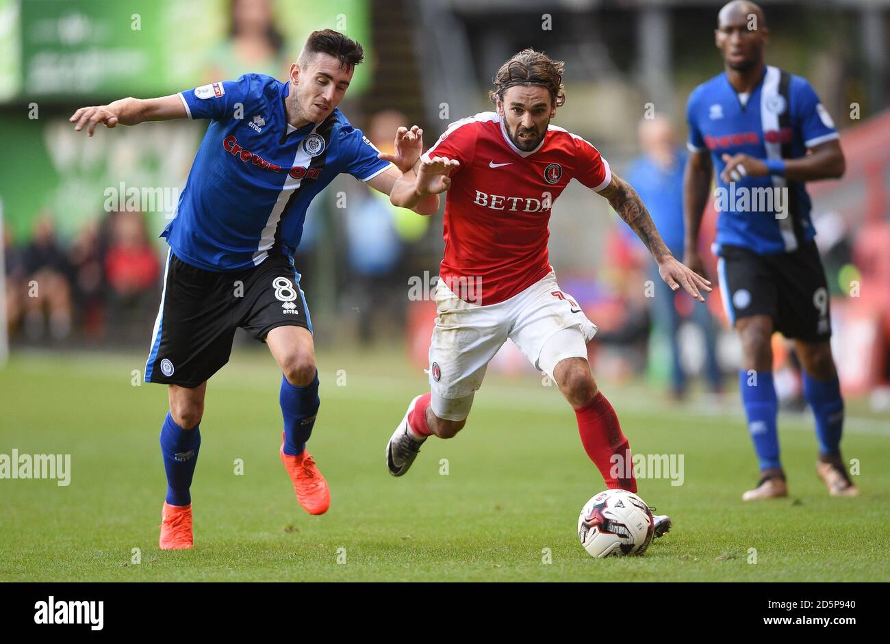 Charlton Athletic's Ricky Holmes gets away from Rochdale's Matty Lund ...