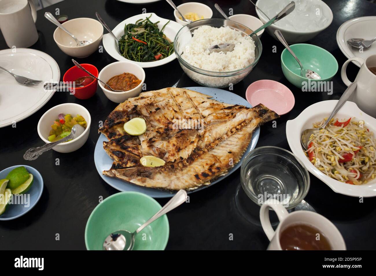 Horizontal close-up view of the several dishes menu placed on a table ...
