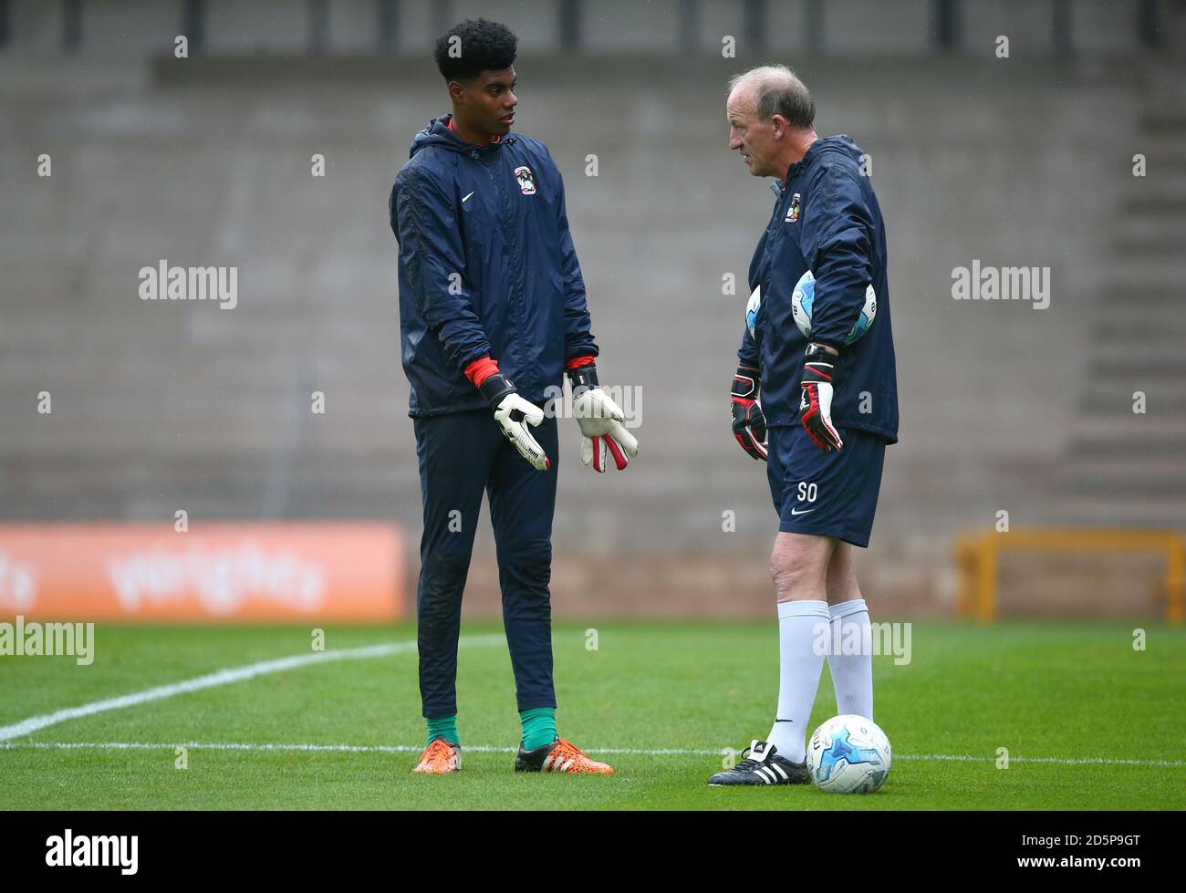 Coventry City goalkeeper Corey Addai (left) with goalkeeper coach Steve ...