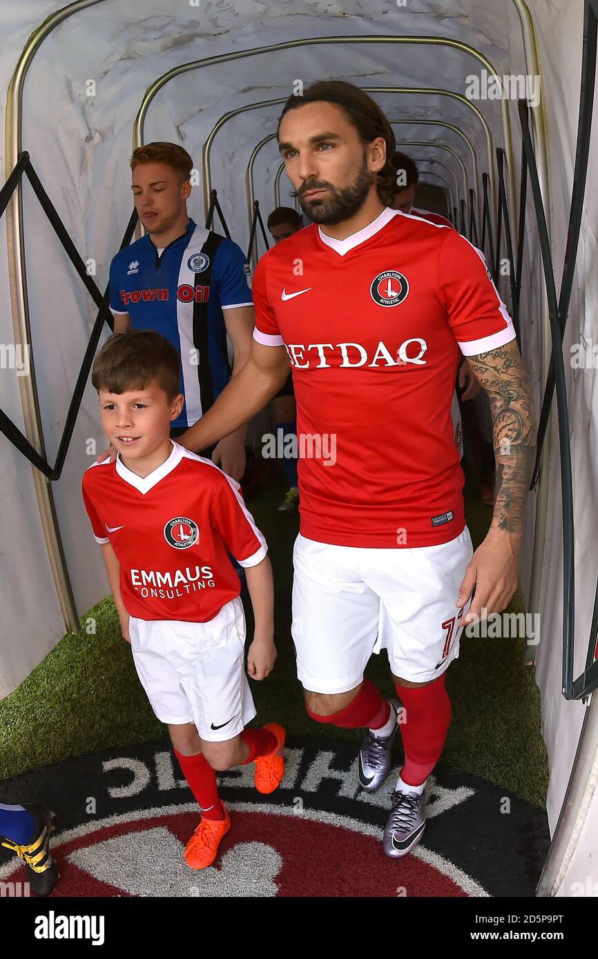 Charlton Athletic's Ricky Holmes walks out at the Valley with a mascot ...