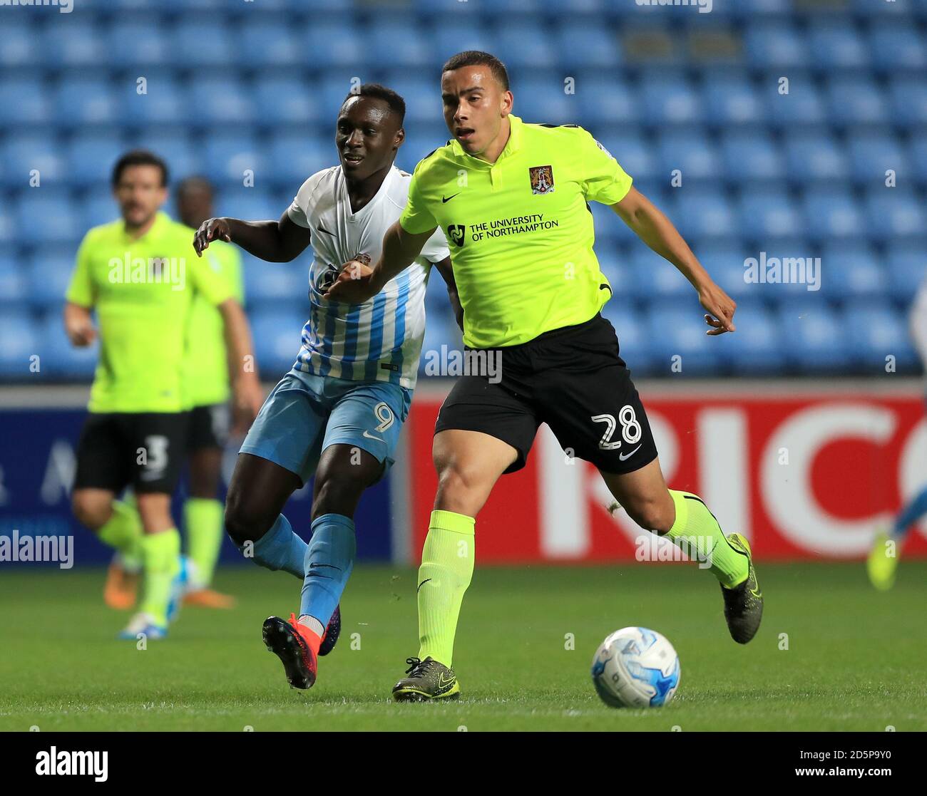 Coventry City's Daniel Agyei (left) and Northampton Town's Rodney ...