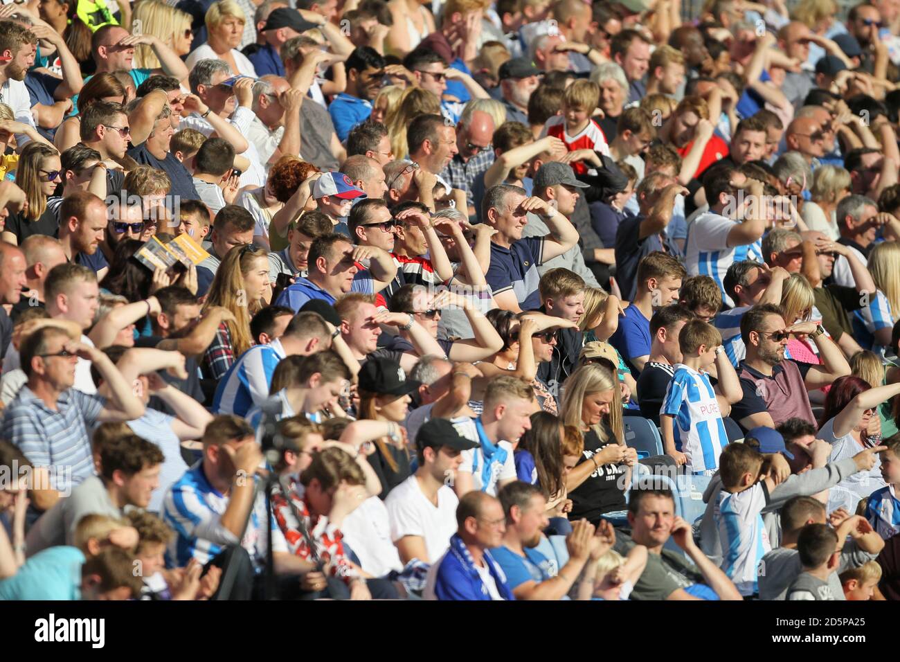 Fans shield eyes from sun hi-res stock photography and images - Alamy
