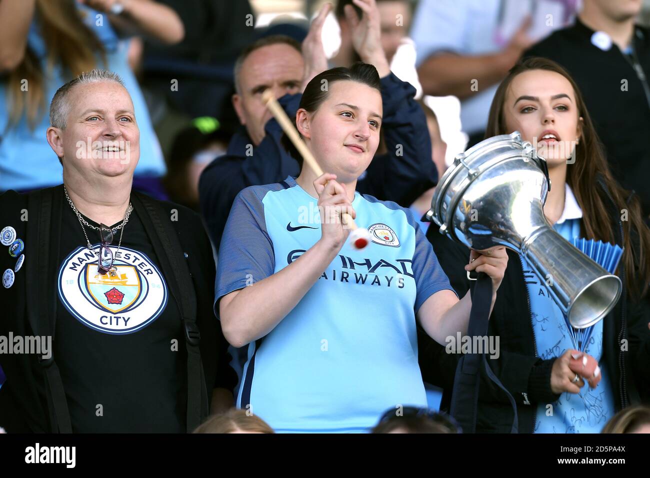 Manchester City fans in the stands at the City Academy Stadium Stock ...