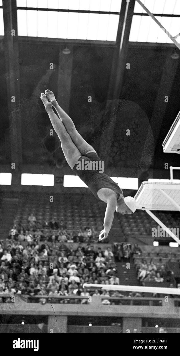 M. Heijkenskjold, of Sweden, competes in the Ladies' Springboard Diving ...