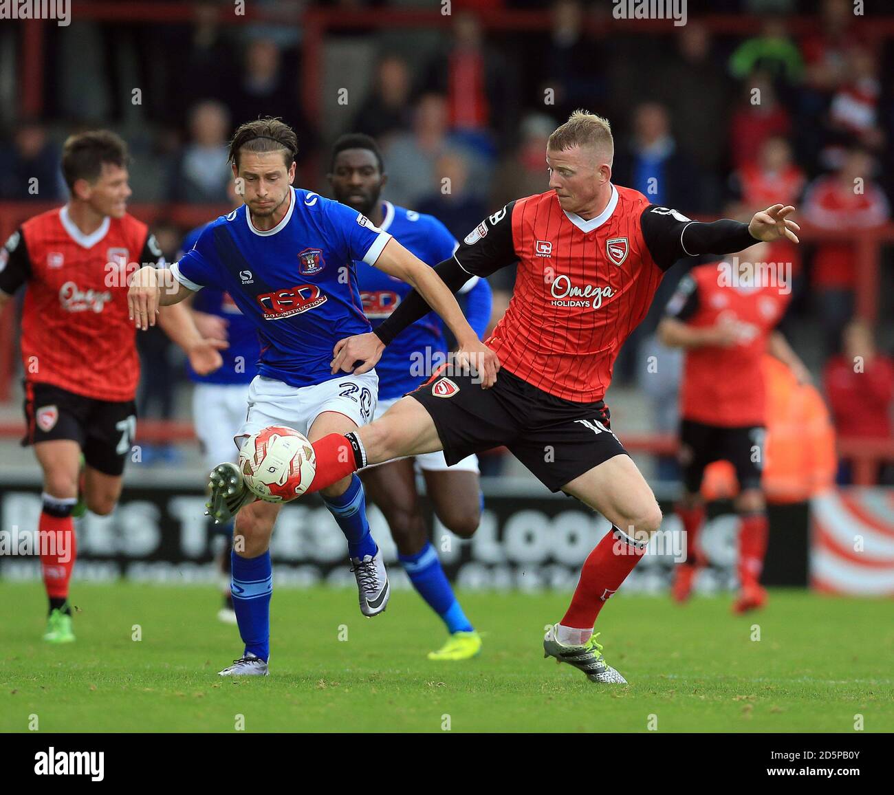 Morecambe's Alex Whitmore (right) and Carlisle United's Shaun Miller ...