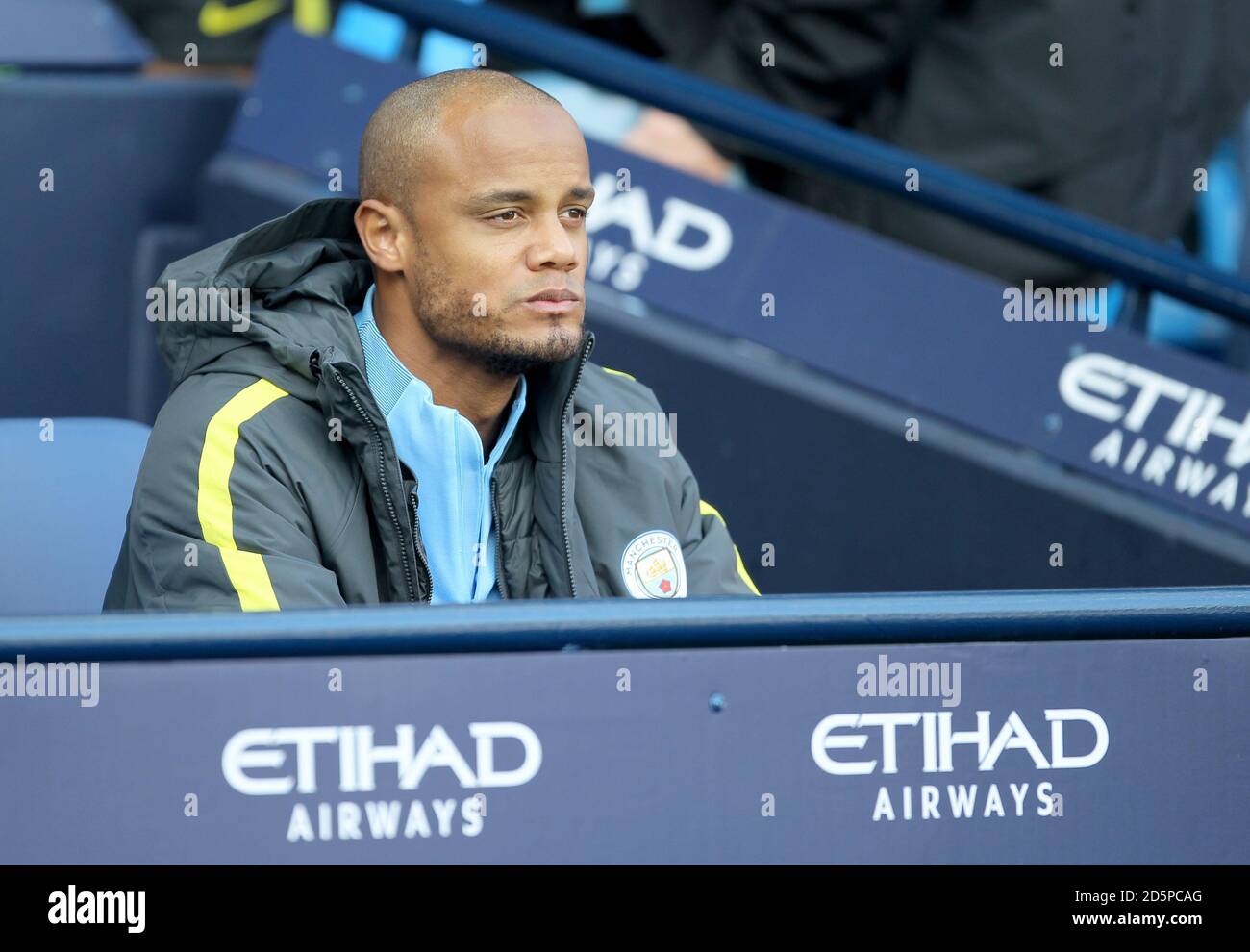 Manchester City's Vincent Kompany on the bench Stock Photo - Alamy