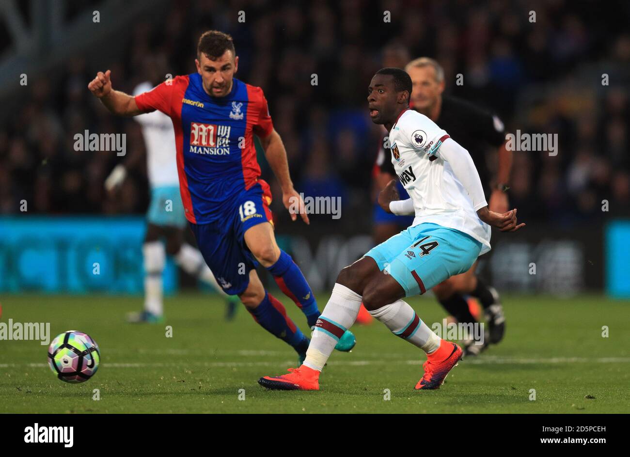 West Ham United's Pedro Obiang in action watched by Crystal Palace's ...