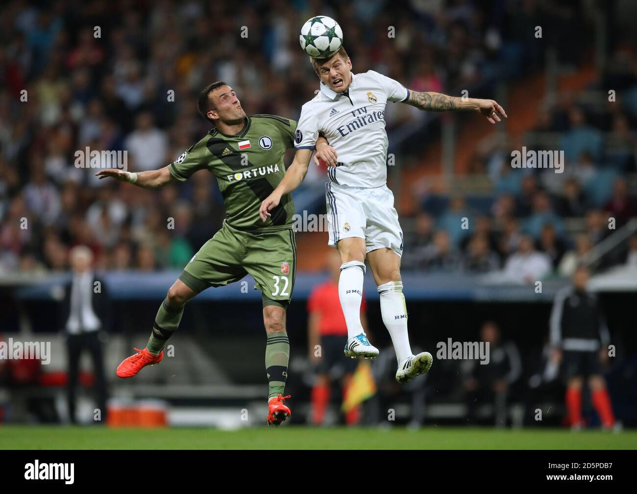 Real Madrid's Toni Kroos wins header beating Legia Warsaw's Miroslav ...
