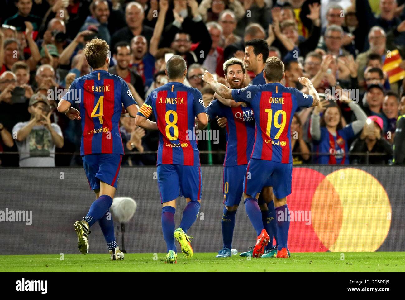 Barcelona's Lionel Messi (centre right) celebrates scoring his side's ...