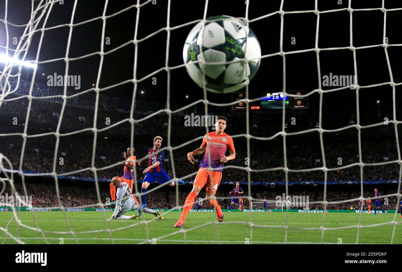 Barcelona's Lionel Messi scores his side's third goal of the game Stock ...