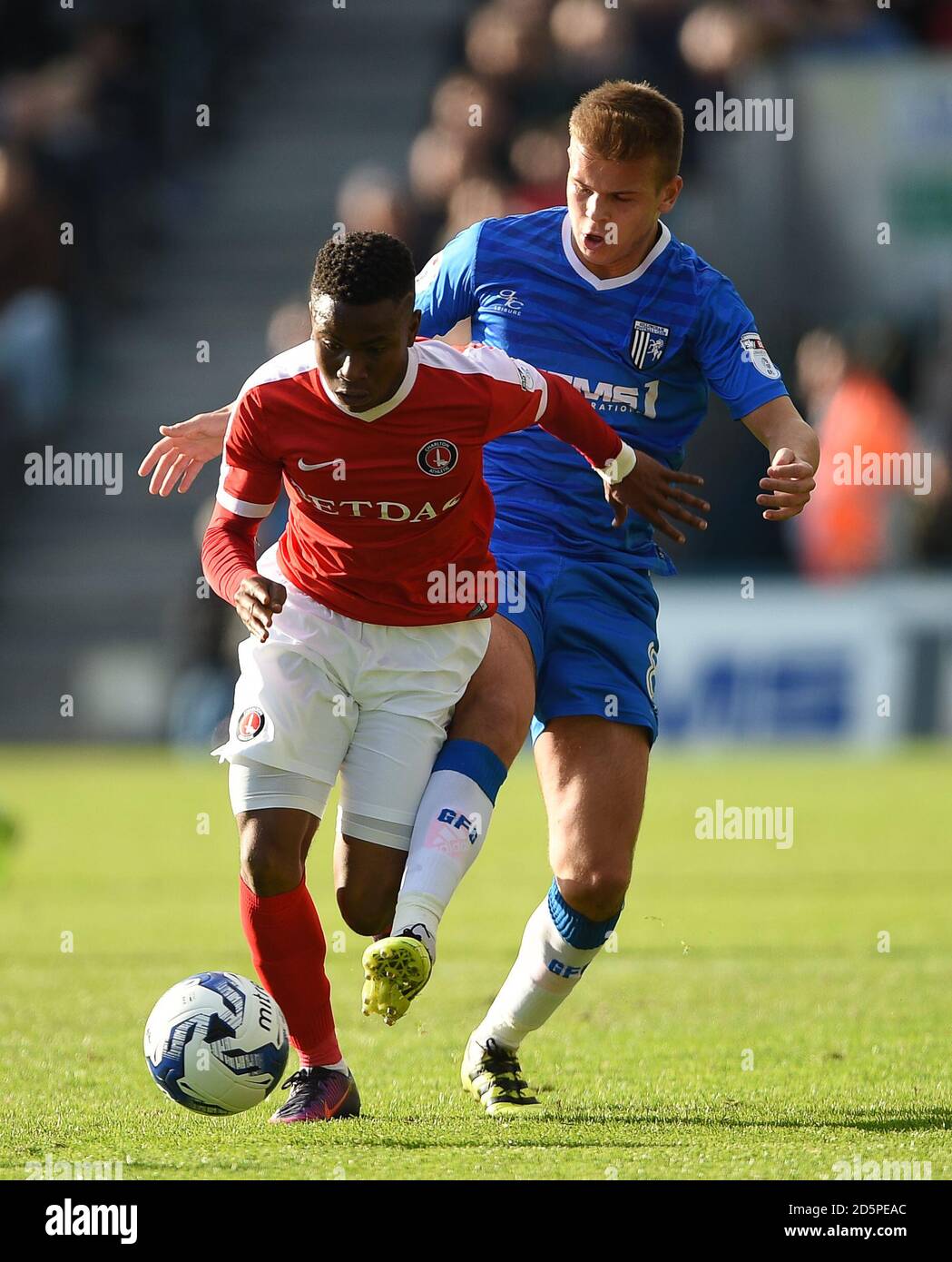 Gillingham's Jake Hessenthler tackles Charlton Athletic's Ademola ...