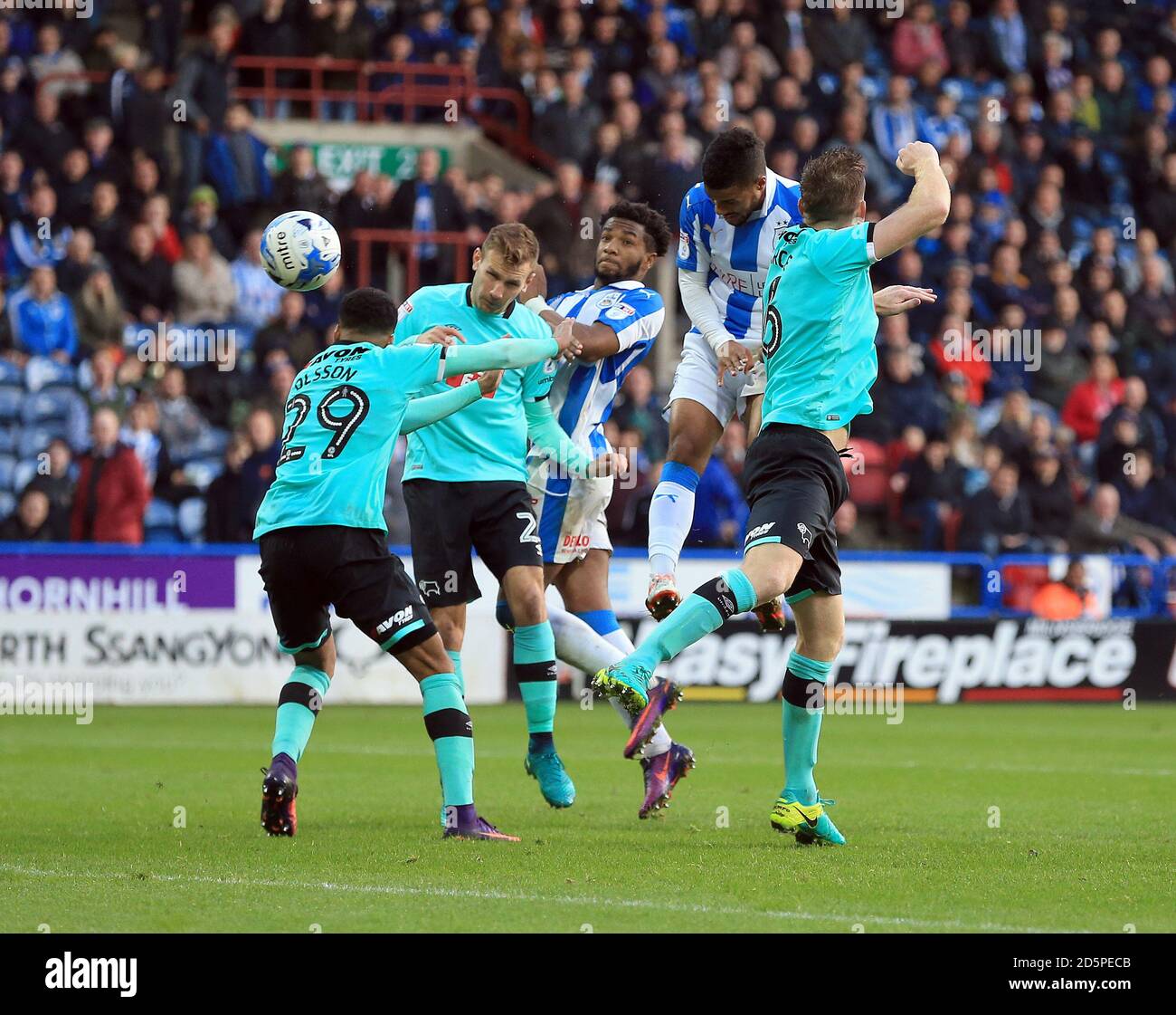 Huddersfield Town's Elias Kachunga (right) scores his sides first goal ...