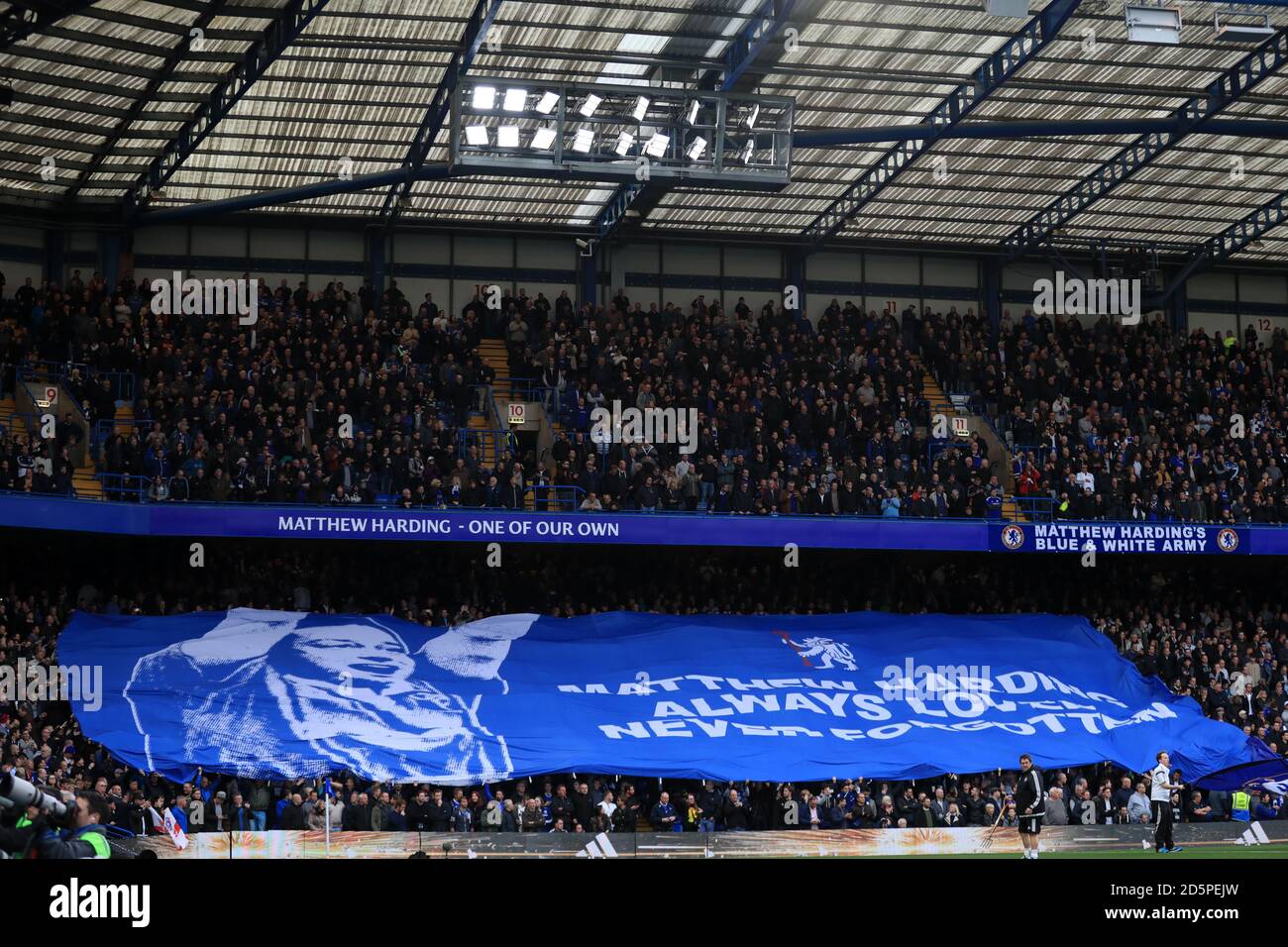 Chelsea fans in the stands hold up a banner in tribute to former vice ...