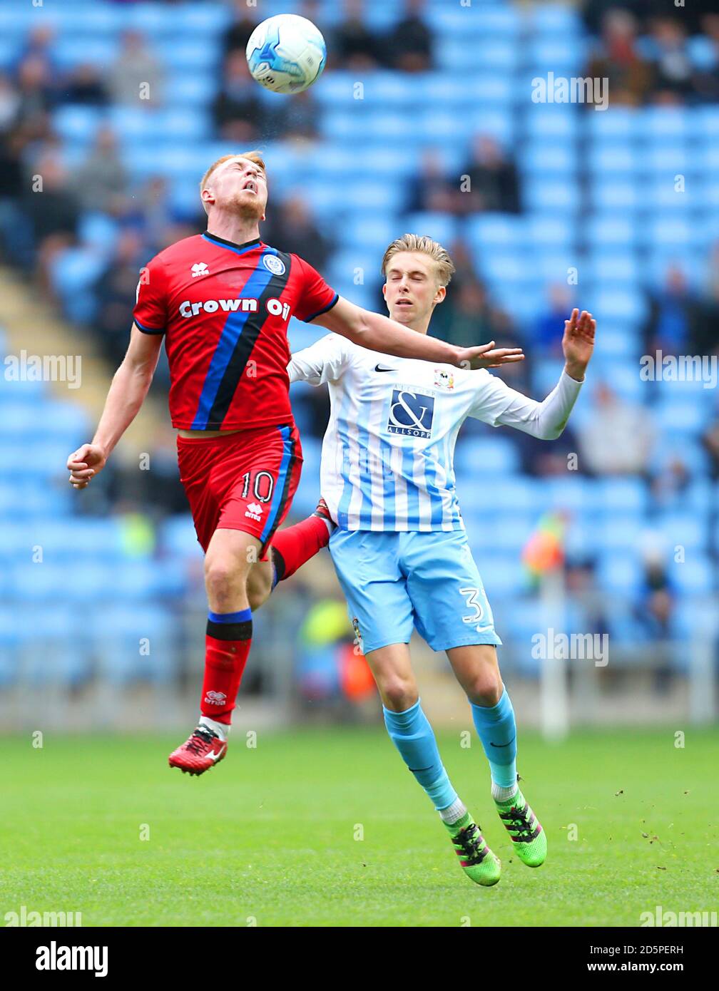 Rochdale's Callum Camps (left) and Coventry City's Chris Stokes battle ...