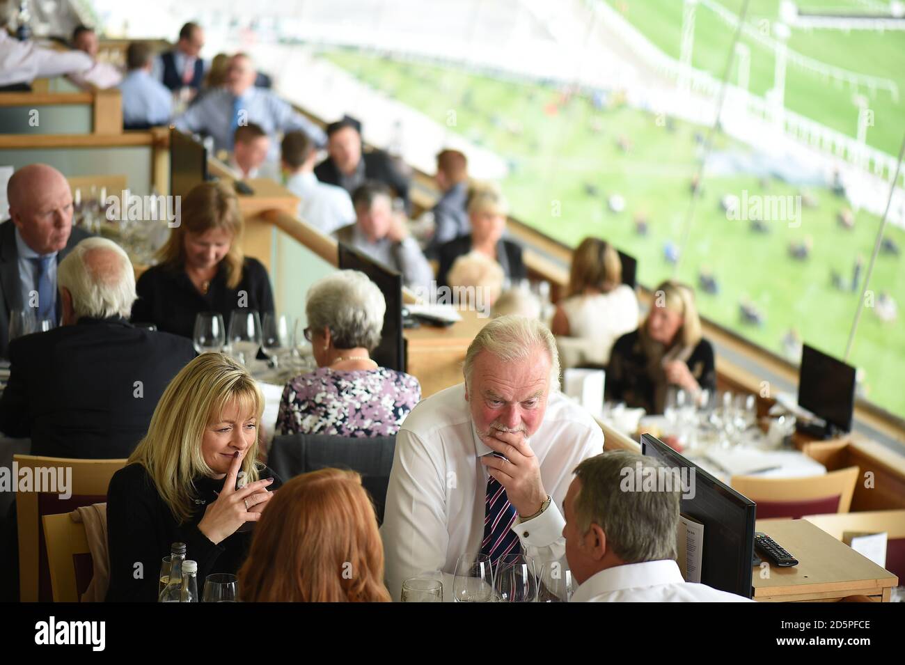 Racegoers soak up the atmosphere in the Panoramic Restaurant at ...