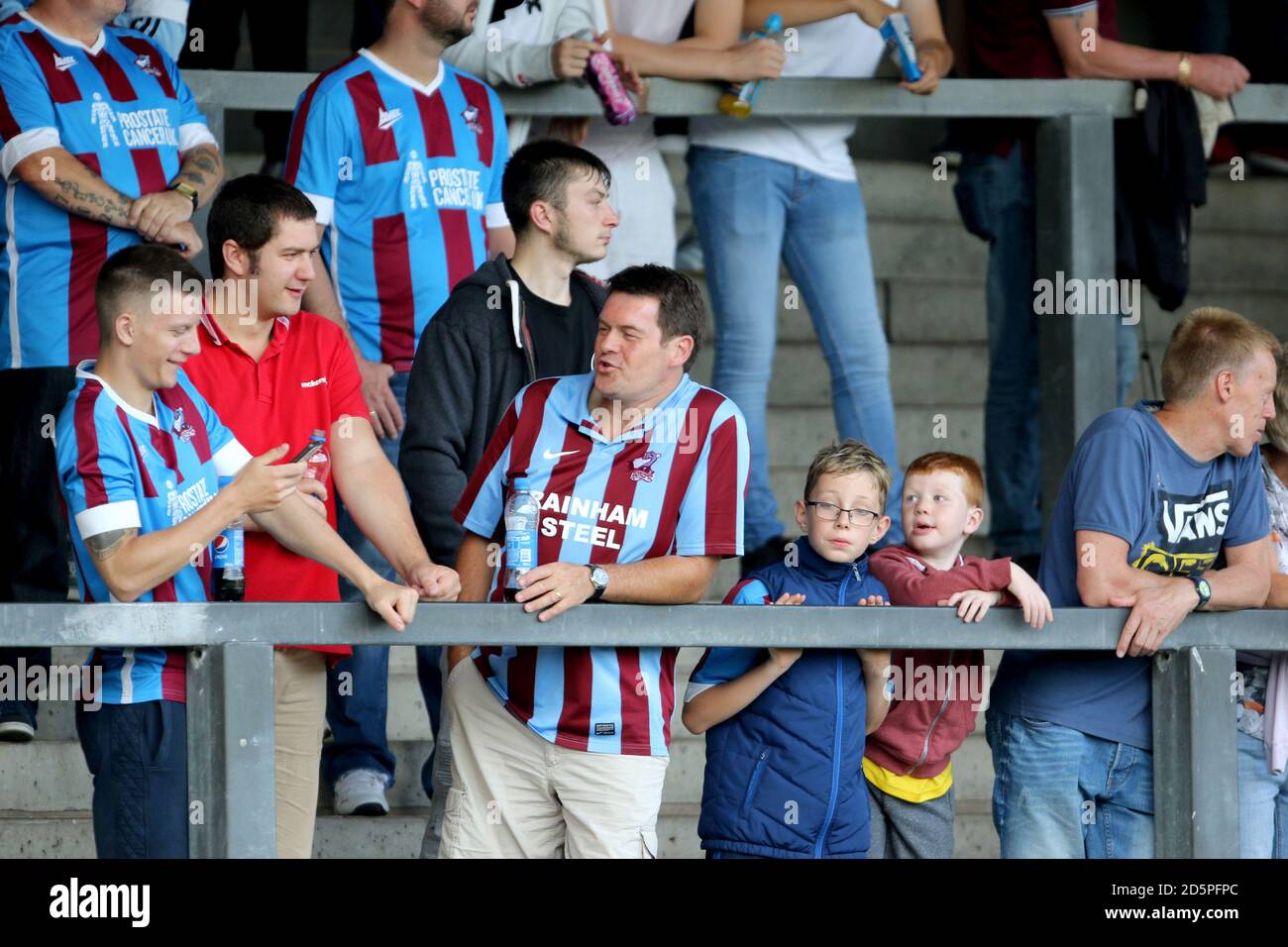 Scunthorpe United fans in the stands Stock Photo - Alamy