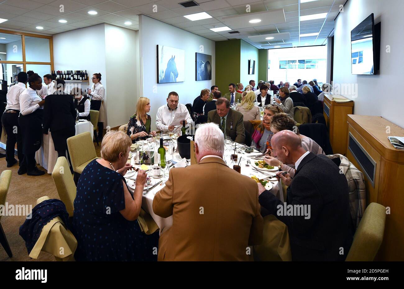 Racegoers enjoy food in the Panoramic Restaurant at Cheltenham ...