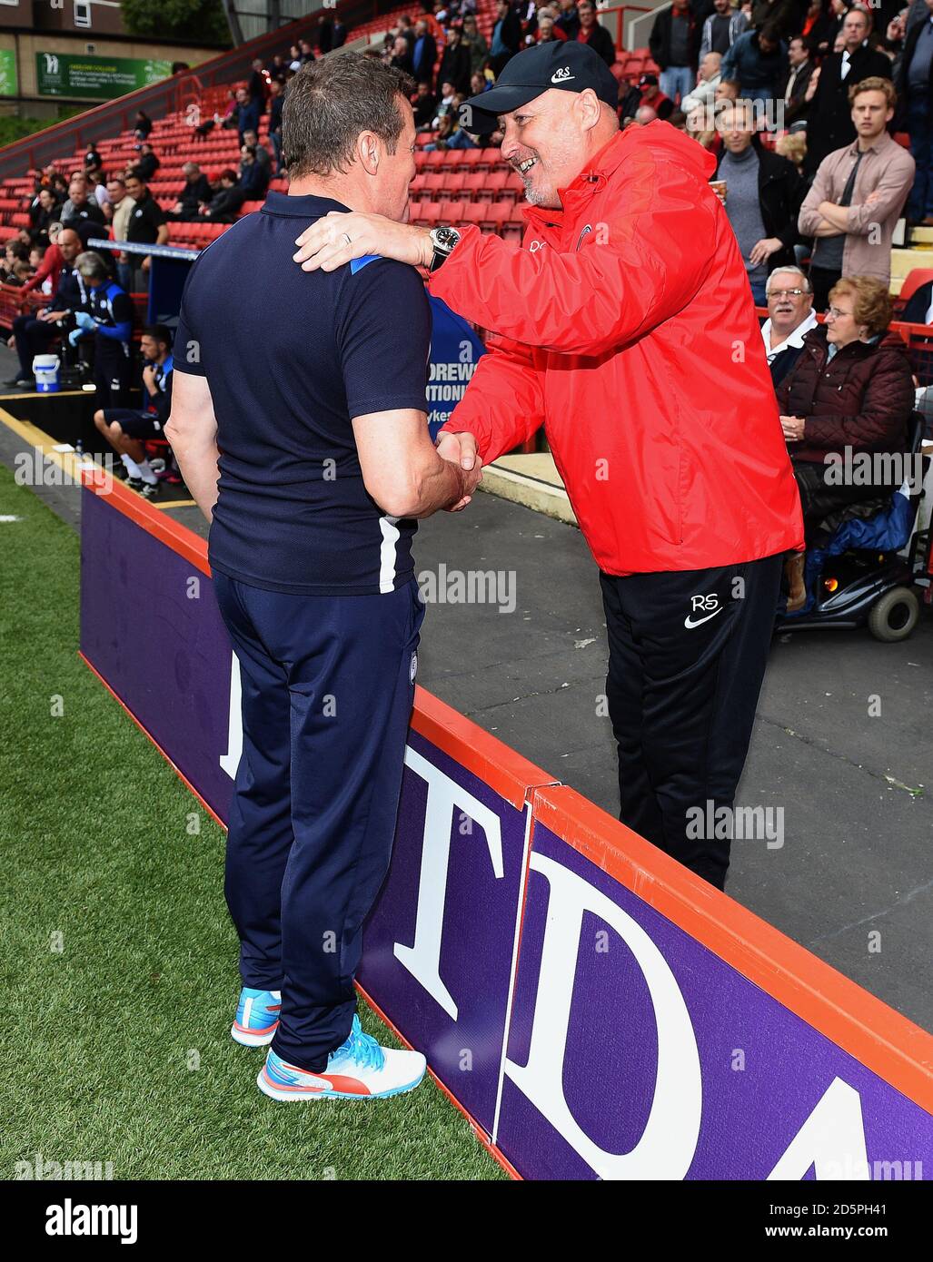 Charlton Athletic manager Russell Slade greets Chesterfield manager ...