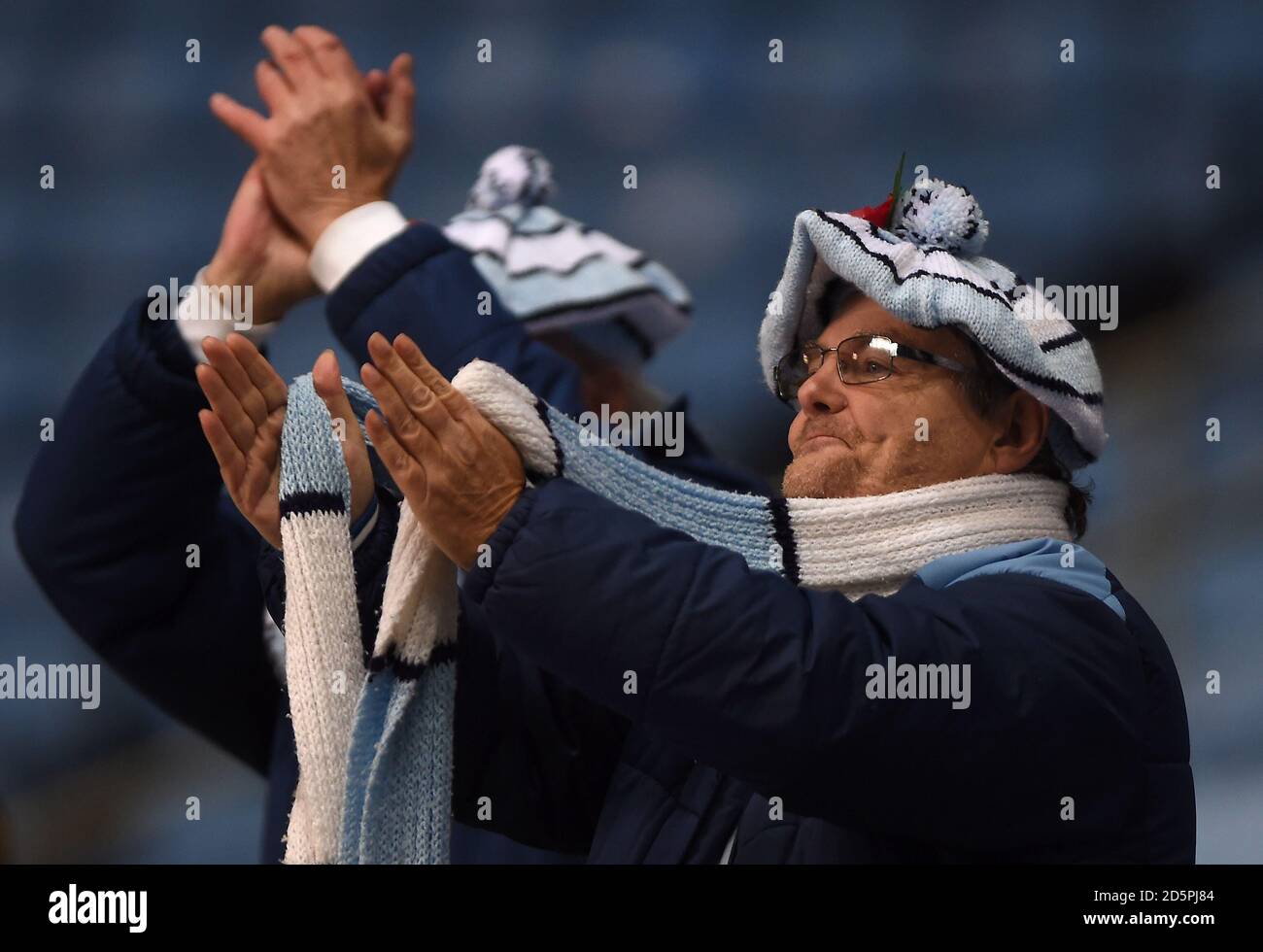 Coventry City fans applaud their team at the end of the match Stock ...