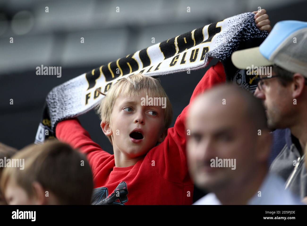 Port Vale fans cheer on their side in the stands Stock Photo - Alamy