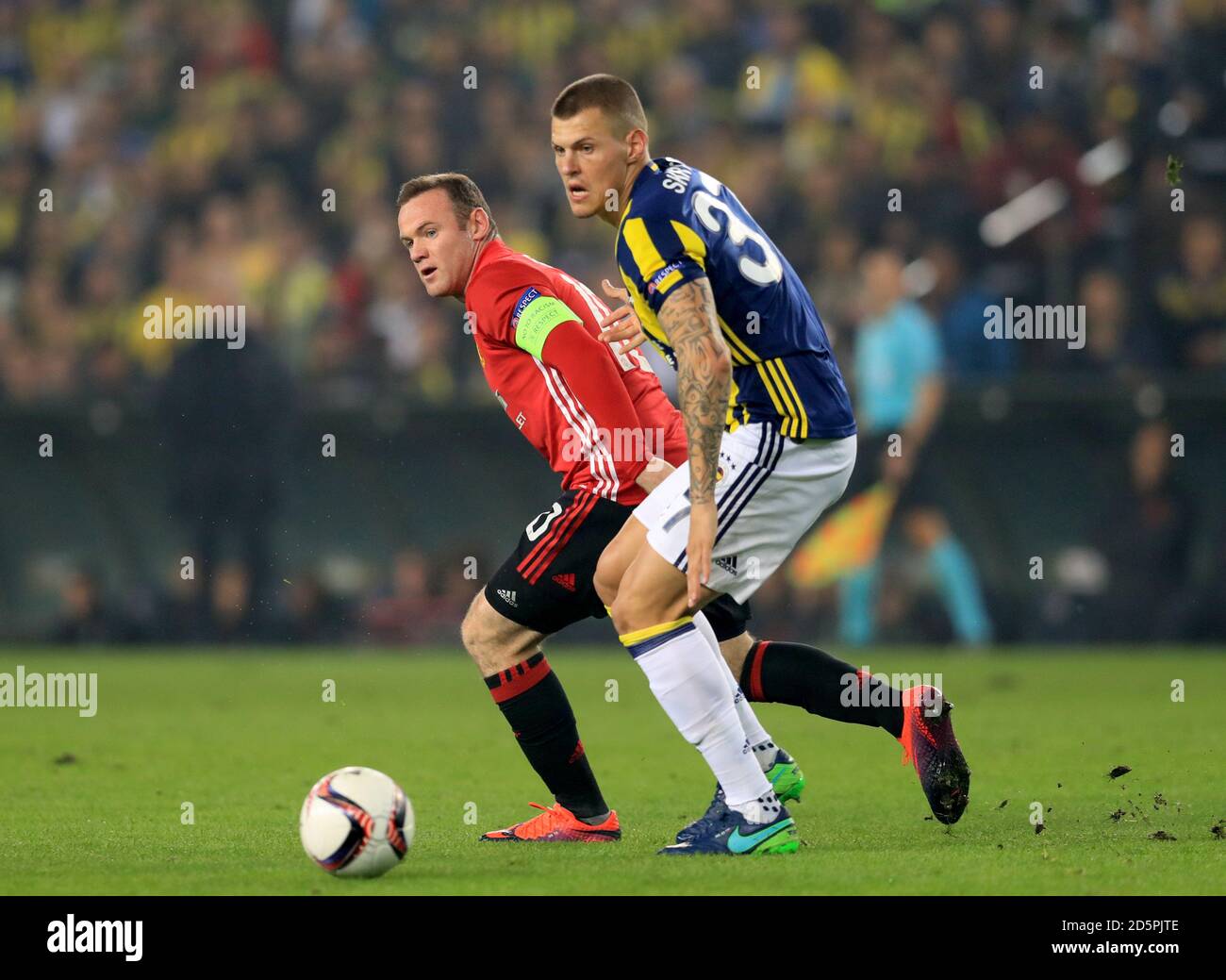 Manchester United's Wayne Rooney and SK Fenerbahce's Martin Skrtel ...
