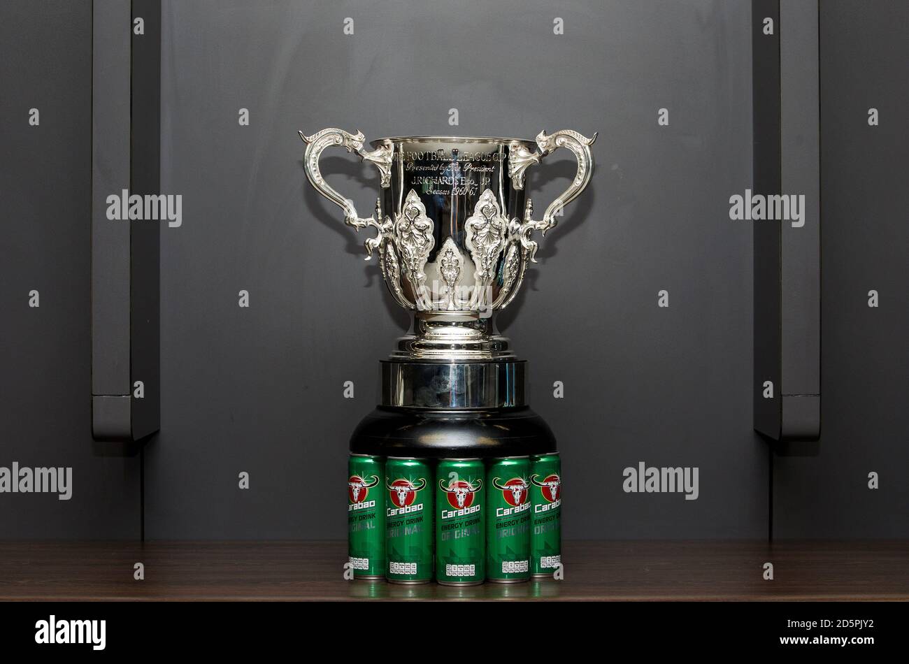 A view of the EFL Trophy on display with cans of Carabao energy drink ...