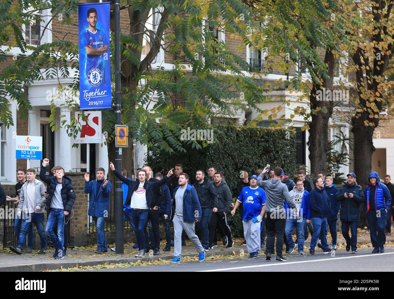 Everton supporters make their way down the Kings Road before the game ...