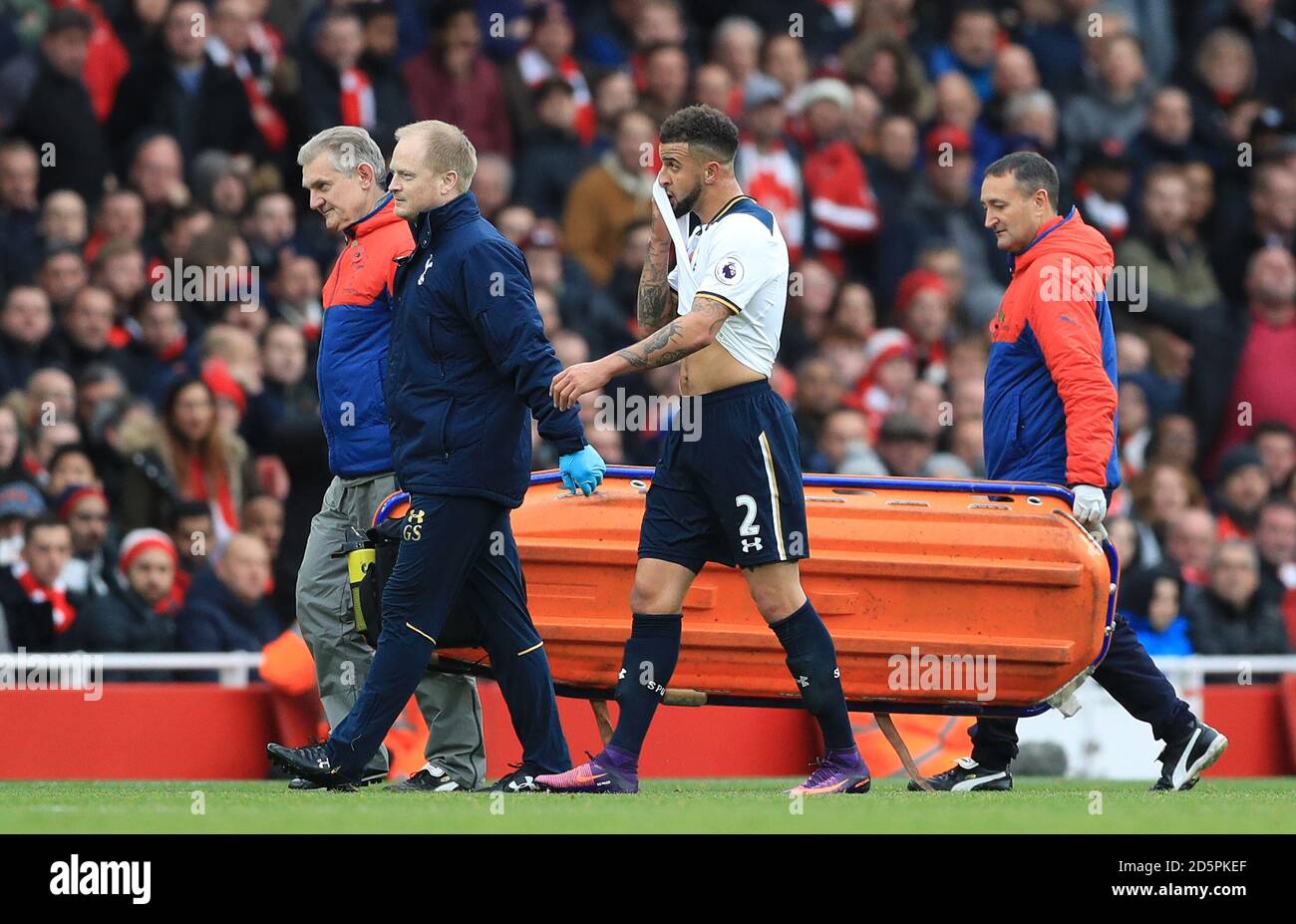 Tottenham Hotspur's Kyle Walker leaves the pitch after picking up an ...