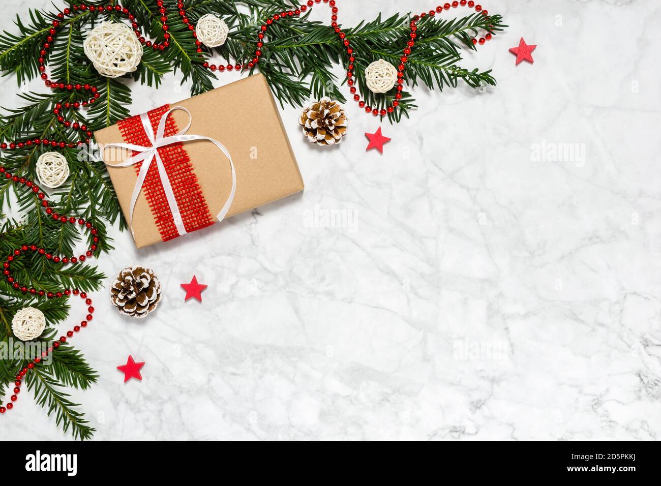 Christmas handmade gift box, conifer tree branches, pine cones and ...