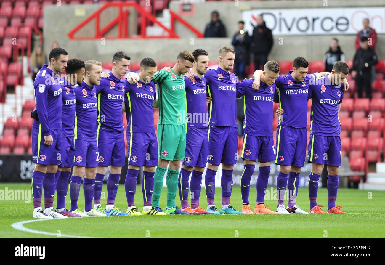 Charlton athletics players observe the minutes silence hi-res stock ...