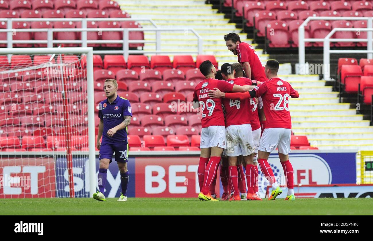 Swindon Town's players celebrate after going 1-0 up against Charlton ...