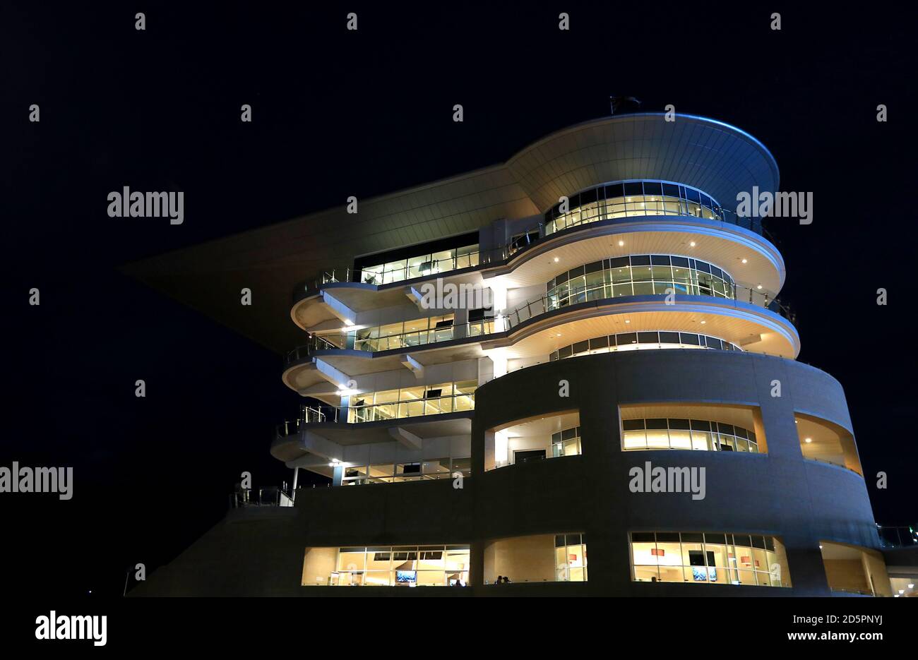 General view of the grandstand lit up at night Stock Photo - Alamy