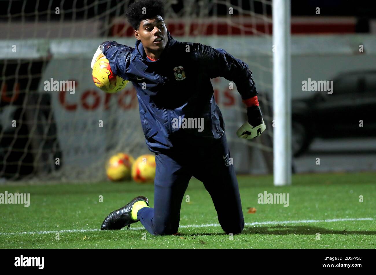 Coventry City goalkeeper Corey Addai warming up prior to the match ...