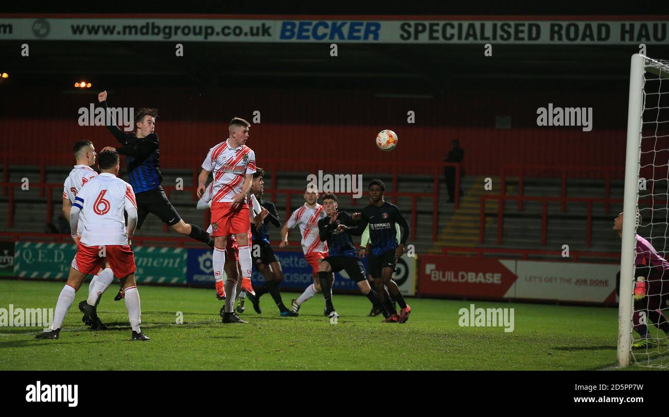 Charlton Athletic's Alex Willis (back left) gets a header on goal ...
