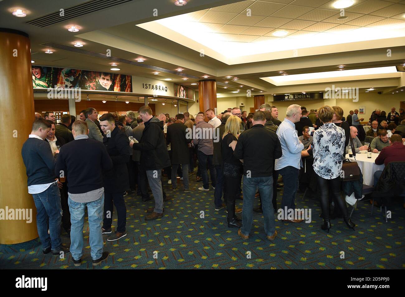 A general view of racegoers in the Istabraq bar at Cheltenham ...