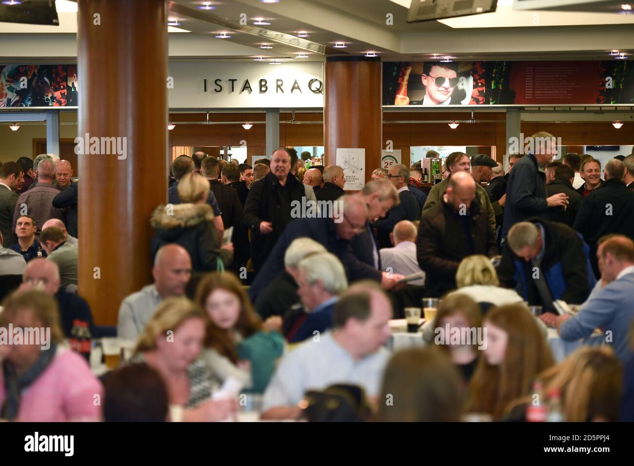 A general view of racegoers in the Istabraq bar at Cheltenham ...