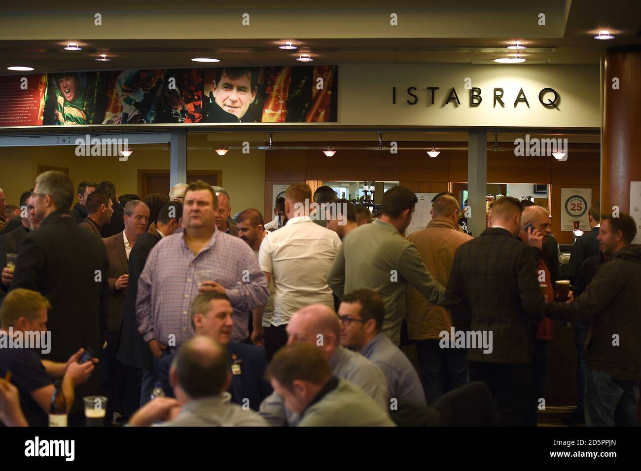 A general view of racegoers in the Istabraq bar at Cheltenham ...