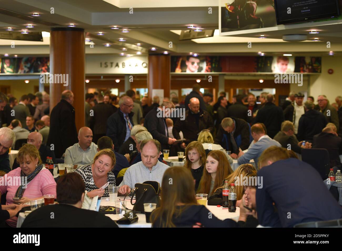 A general view of racegoers in the Istabraq bar at Cheltenham ...