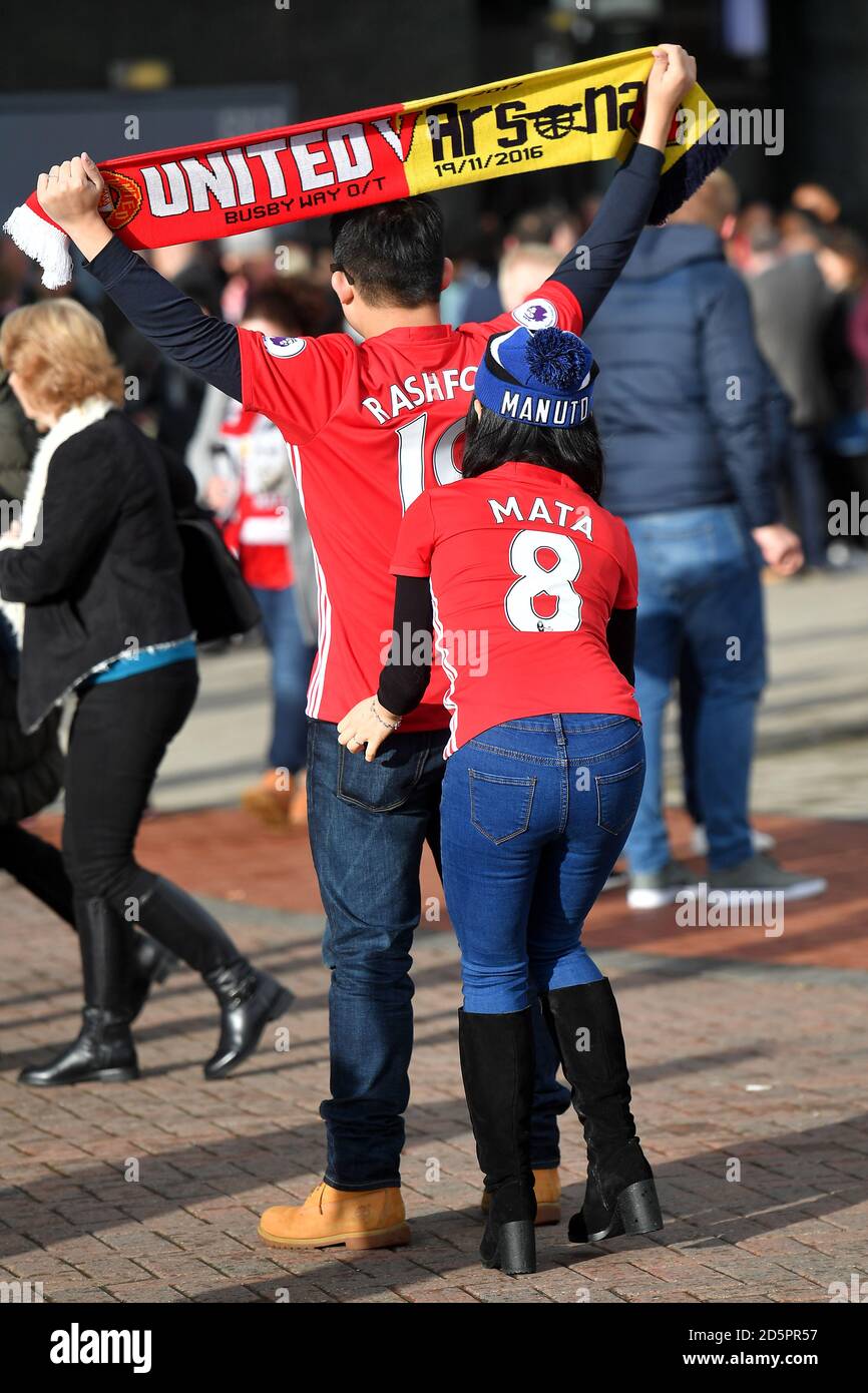 Fan poses with scarf before the Premier League match at Old Trafford ...