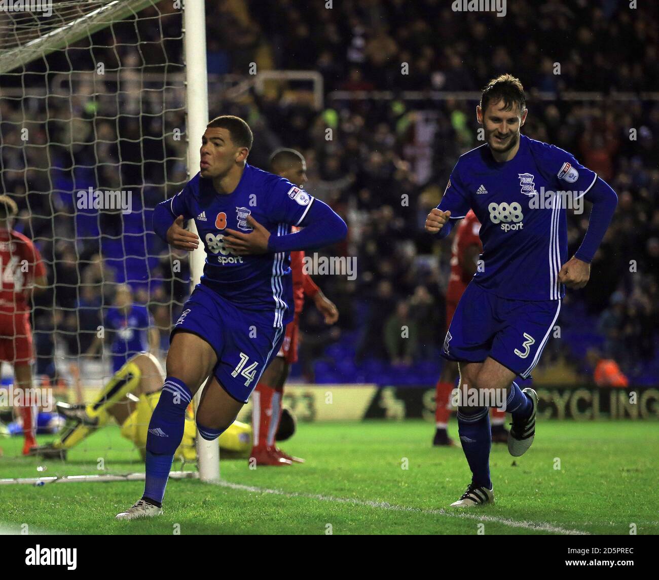Birmingham City's Che Adams (left) celebrates after he scores his sides ...