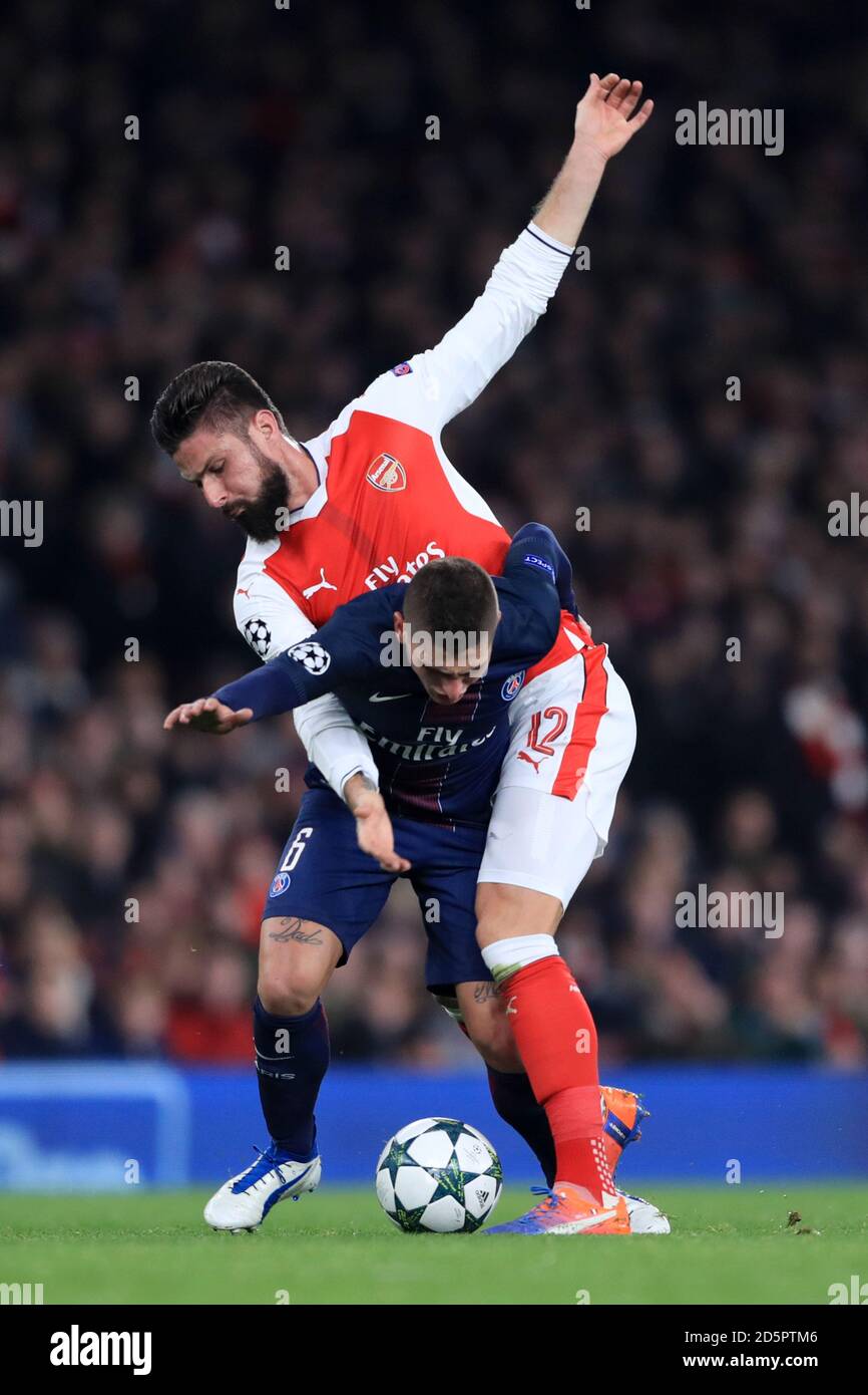Paris Saint-Germain's Marco Verratti (left) challenges Arsenal's ...