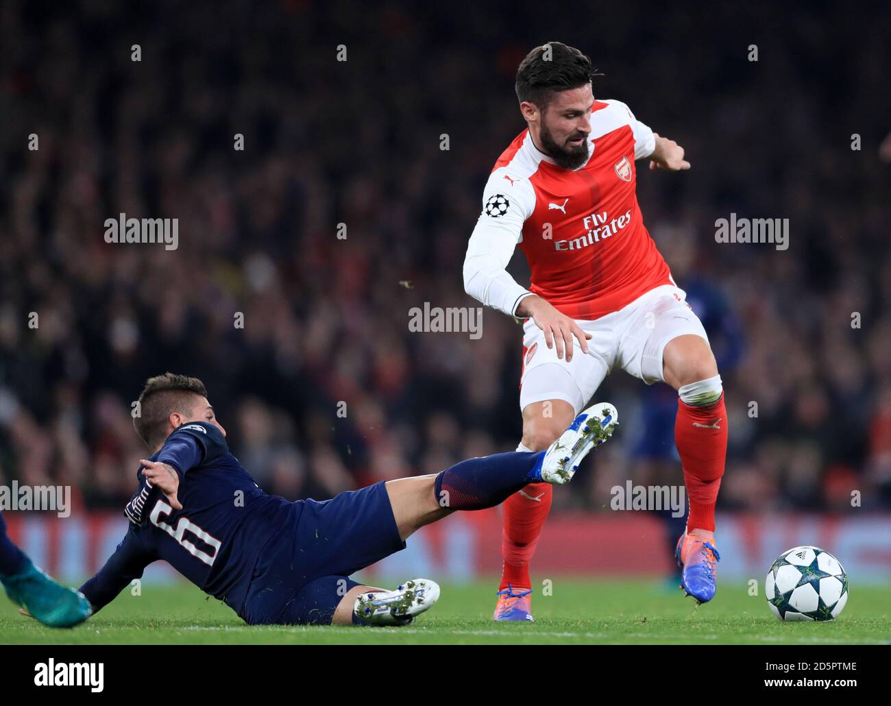 Paris Saint-Germain's Marco Verratti (left) challenges Arsenal's ...