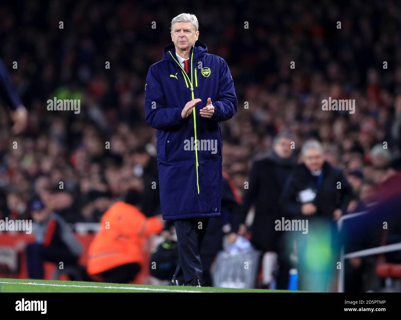 Arsenal manager Arsene Wenger applauds on the touchline Stock Photo - Alamy