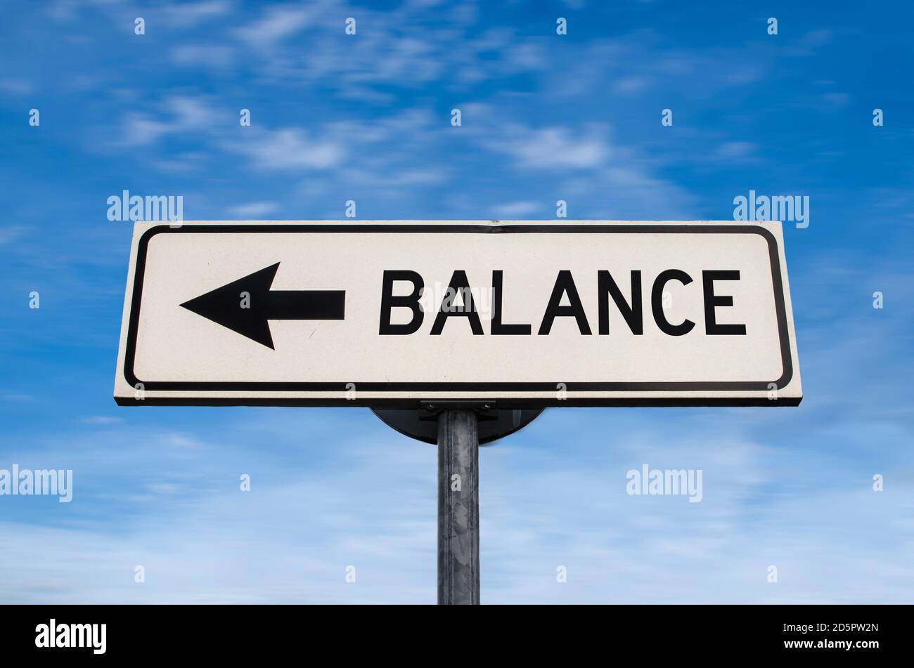 Balance road sign, arrow on blue sky background. One way blank road ...