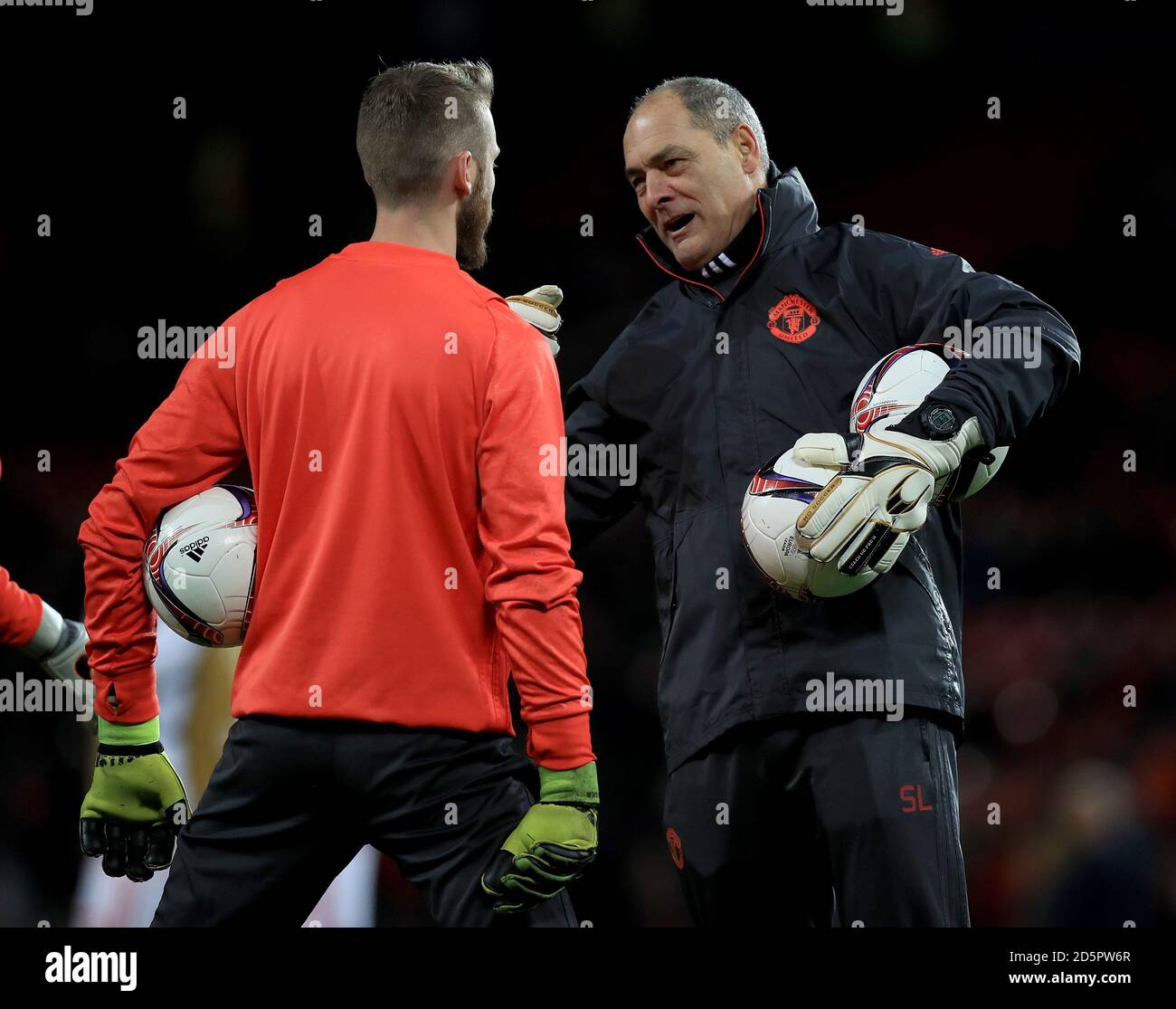 Manchester United goalkeeper David De Gea (left) speaks with coach ...
