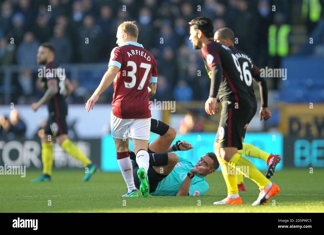 Referee Andre Marriner on floor Stock Photo - Alamy