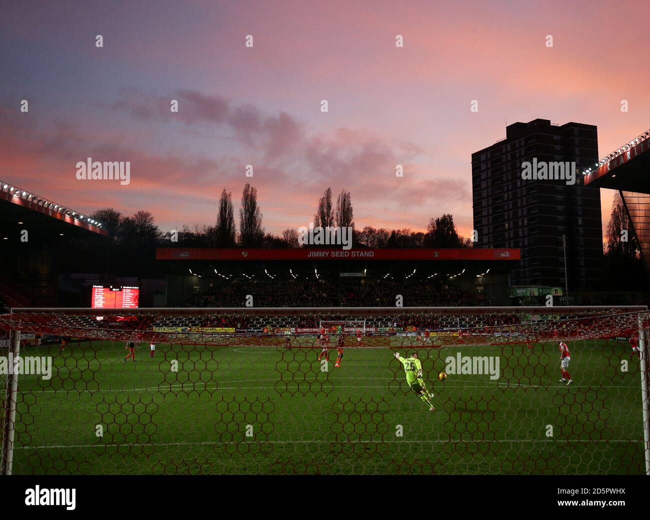 The sun sets over the Jimmy Seed stand Stock Photo - Alamy