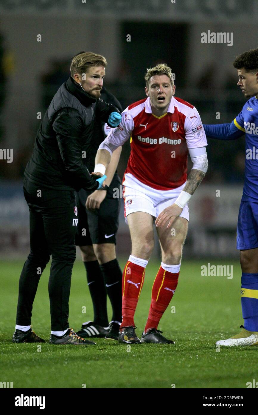 Rotherham United's Greg Halford leaves the pitch in pain Stock Photo ...