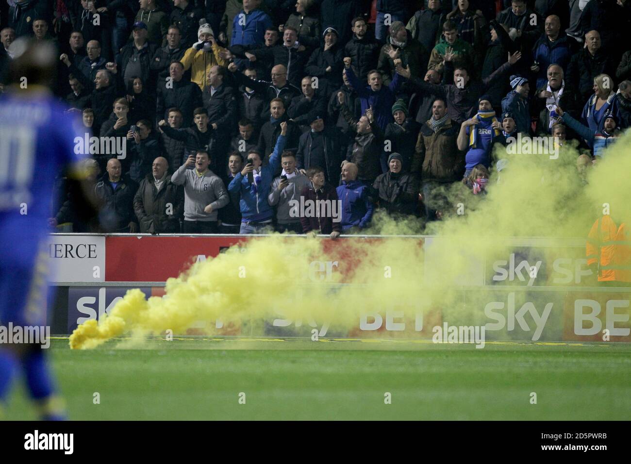 A flare is thrown on the pitch during the match Stock Photo - Alamy