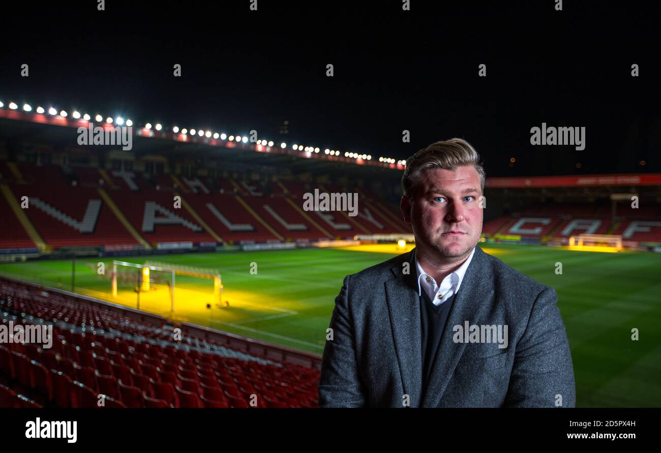 Charlton Athletic's new manager Karl Robinson poses after his press ...